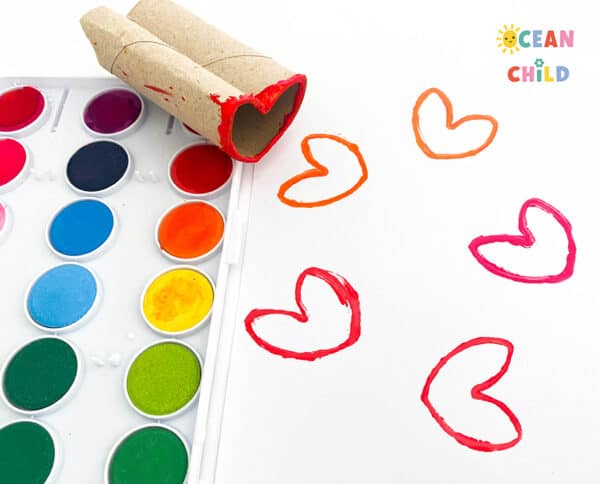 Love bug craft, paper roll stamp activity for kids - Ocean Child Crafts